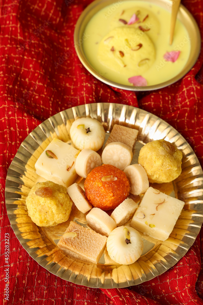 Diwali sweets Gujiya barfi Motichoor Laddu Rasmalai Indian sweet ...