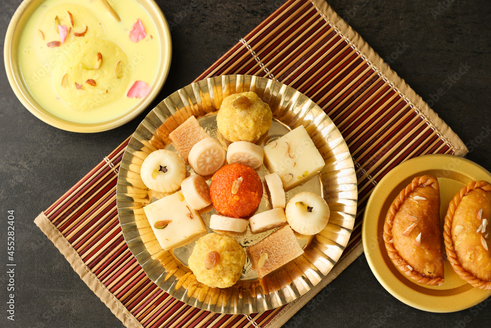 Diwali sweets Gujiya barfi Motichoor Laddu Rasmalai Indian sweet ...
