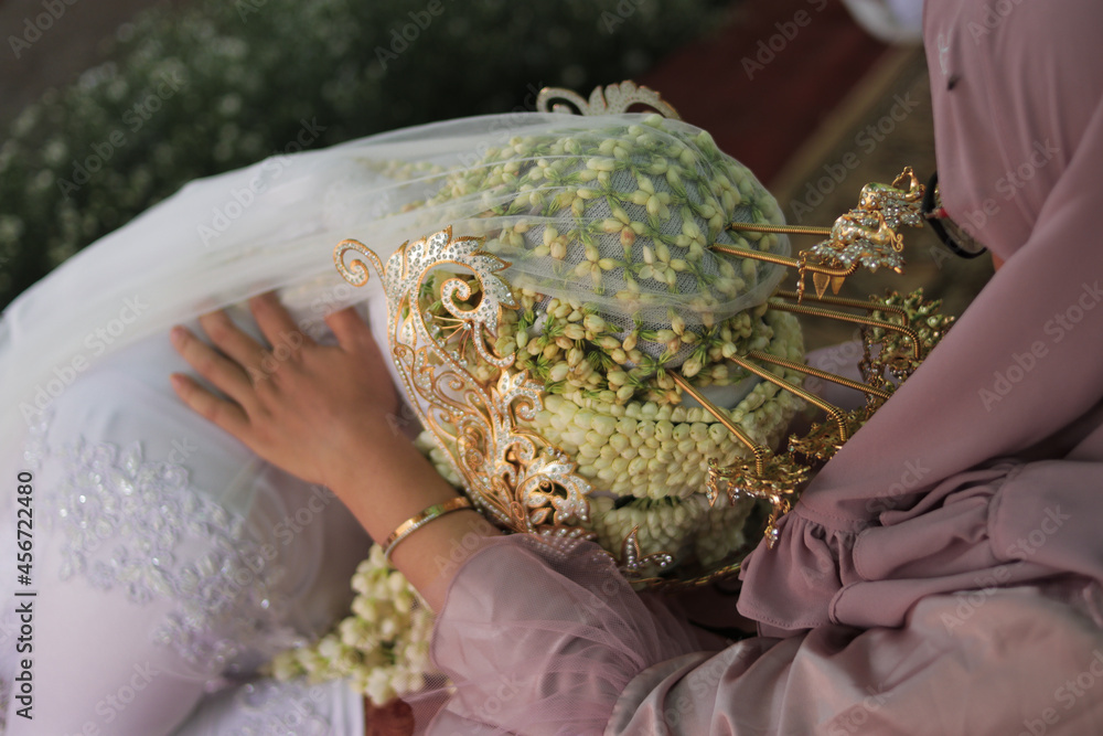 Sungkeman is one of the traditions in Traditional wedding ceremonies in ...