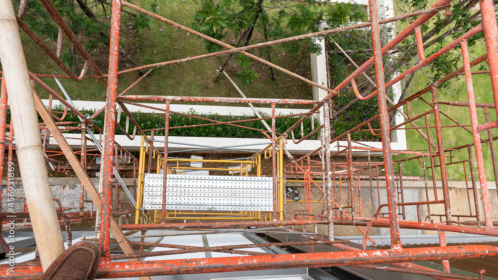 Image of multi-storey building with scaffolding to build a new home on ...
