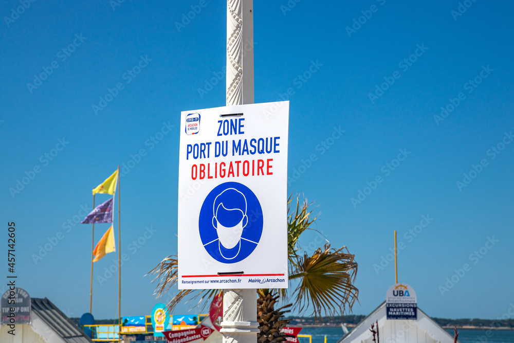 French "mask required zone" sign on the seafront of Arcachon during the ...