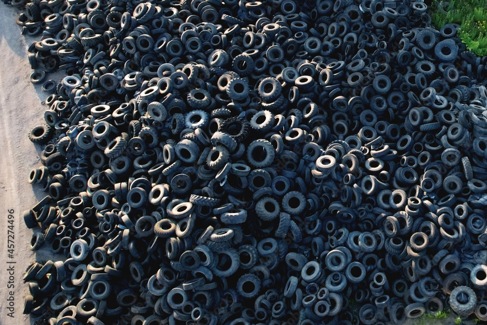 Landfill with old tires and tyres for recycling. Reuse of the waste ...