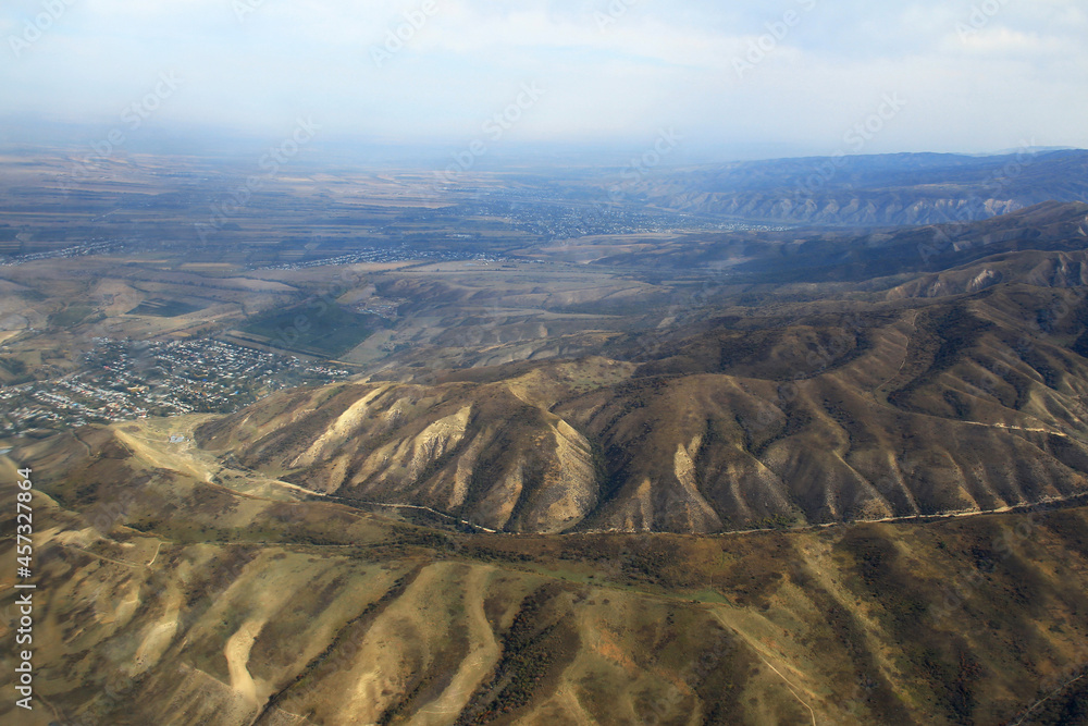 Top view of a chain of mountain ranges of Talgar mountai in autumn,a ...