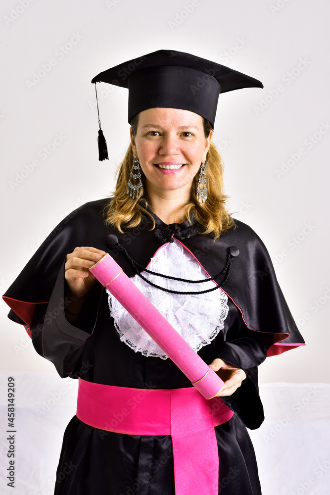 student girl wearing graduation outfit holding graduation certificate ...