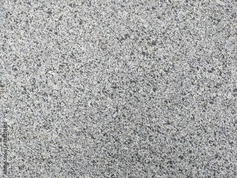 texture of a slab of gray granite stone. smooth grained stone texture ...