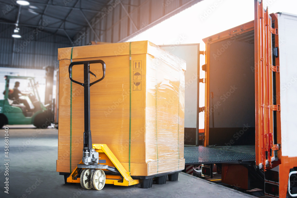 Cargo Packae Boxes with Hand Pallet Truck Loading into Shipping ...
