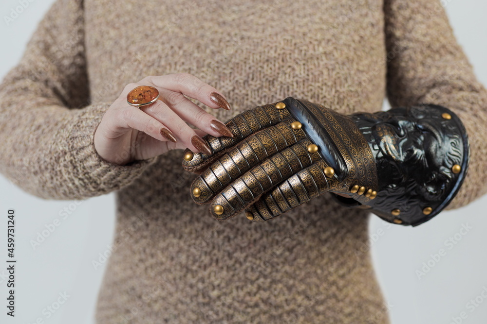 Medieval knightly brown plate gauntlet from Italian armor, in the form ...