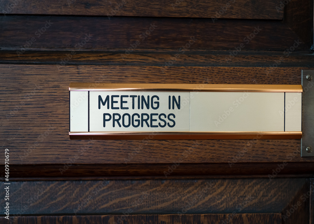 Meeting in progress metal sliding sign on solid dark oak wooden ...