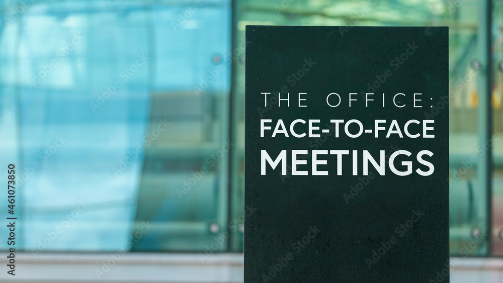 The Office: Face to Face Meetings on a city-center sign in front of a ...