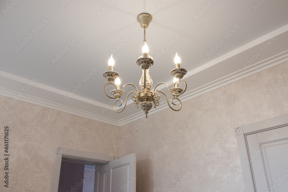 modern lamps in a large house. Chandeliers of an interesting ...