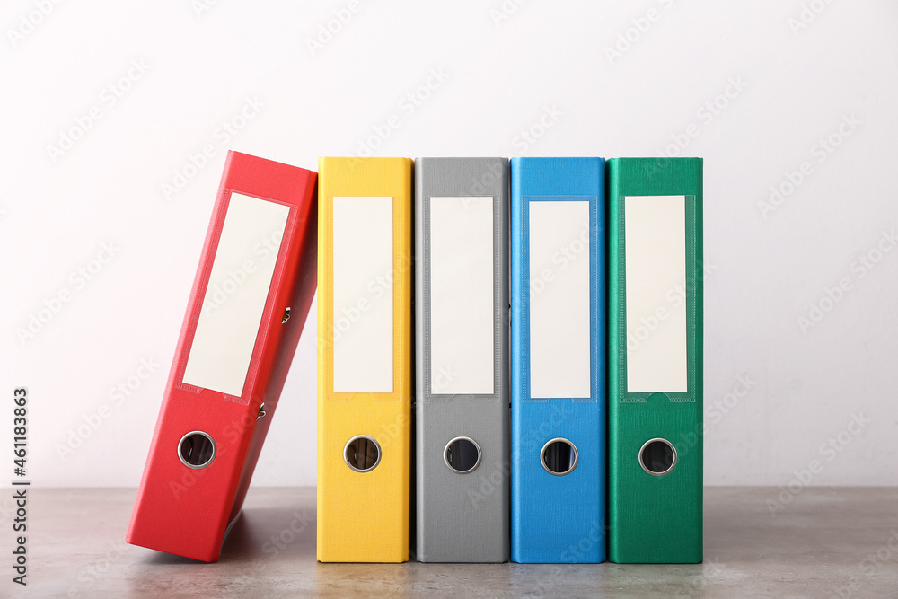 Office folders on light background Stock Photo | Adobe Stock