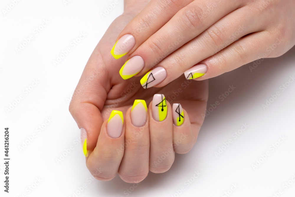 Yellow neon French manicure on long nails with black stripes and dots ...