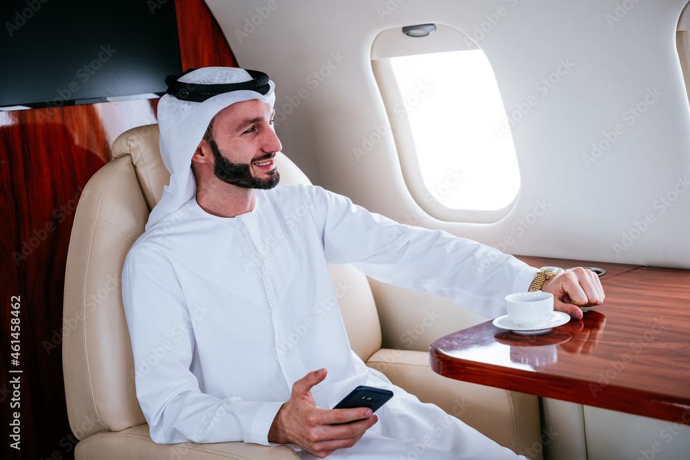 Business man from united arab emirates flying on his private jet to ...