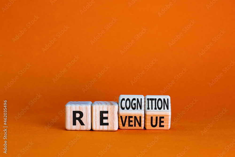 Revenue and recognition symbol. Businessman turned cubes and changed ...