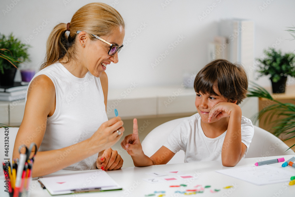 Child recognizing numbers in a preschool assessment test. Stock Photo ...