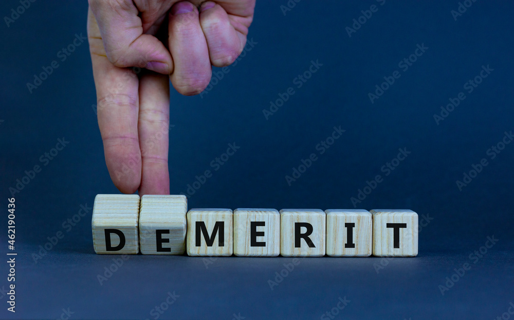 Demerit or merit symbol. Businessman turns wooden cubes and changes ...