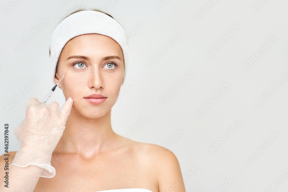 Forehead injection at spa salon. Doctor hands. Closeup. High quality ...