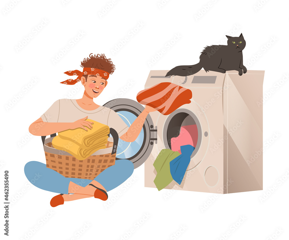 Man loading laundry into washing machine. Househusband at everyday ...