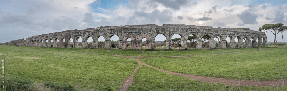 Ruins and arches of the Aqua Claudia aqueduct, a waterbridge from the ...