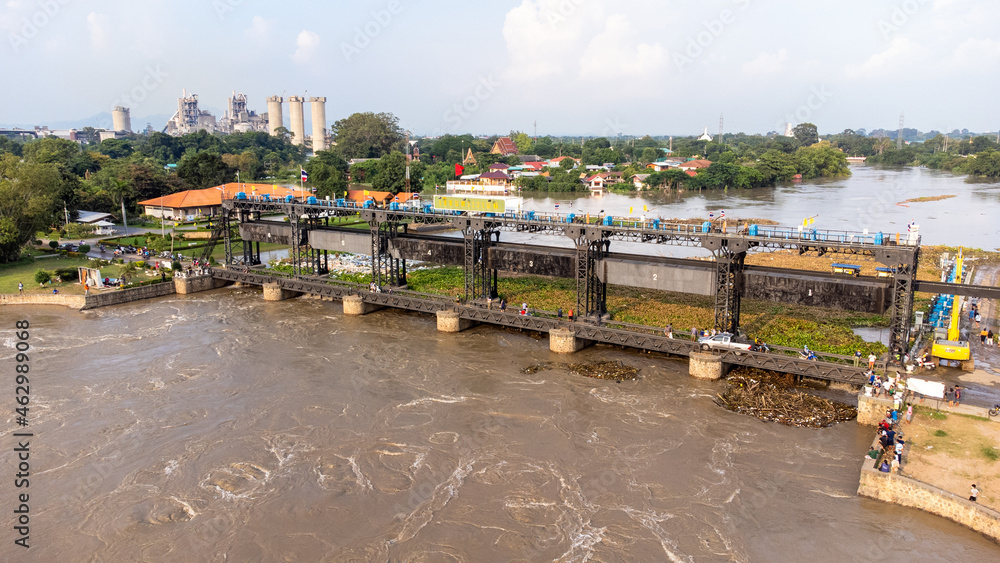 Aerial view of Rama 6 Dam (Phra Narai Gate) in Thailand with powerful ...