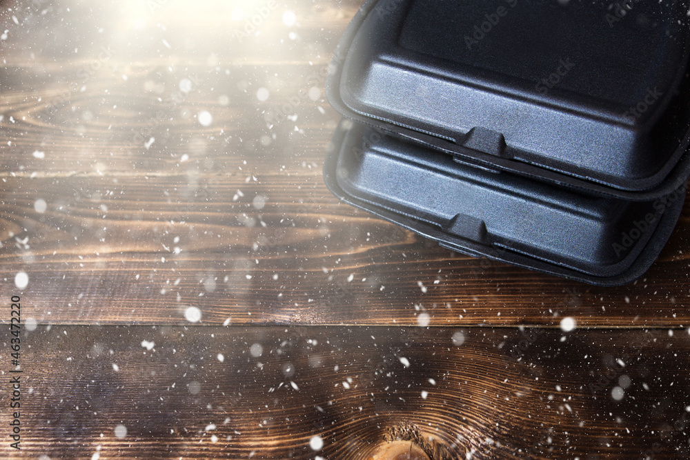 Food delivery containers and a pizza box are stacked. Food delivery ...