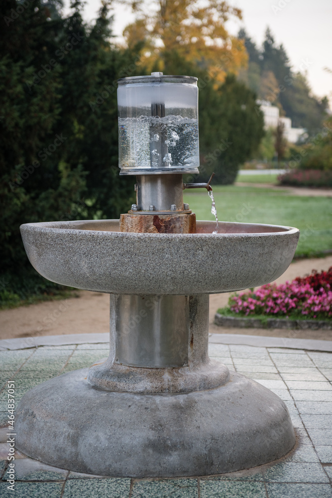 Public natural healing mineral water, spring with mineralized water in ...