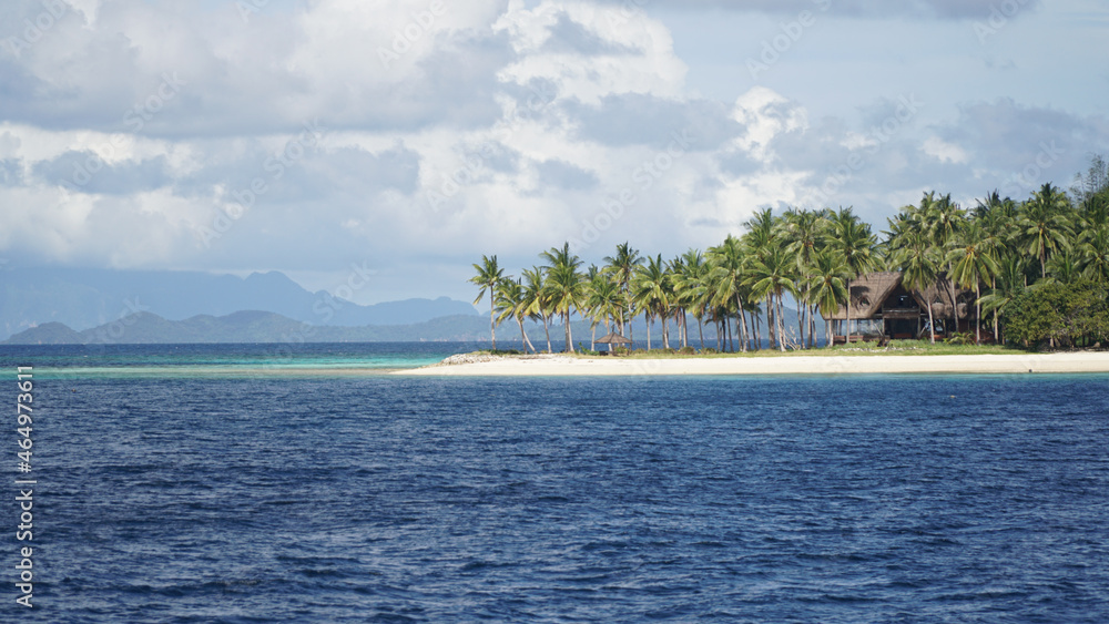 Ocean and jagged rock landscapes with turquoise water at Coron Island ...