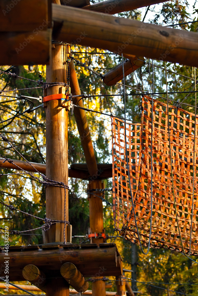 Rope park for children. Extreme outdoor entertainment. Slings, ropes ...