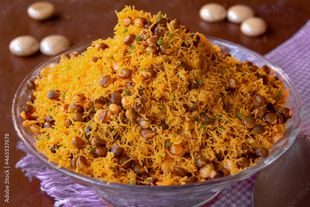 Indian sweet and savory called as Bombay mixture prepared during ...