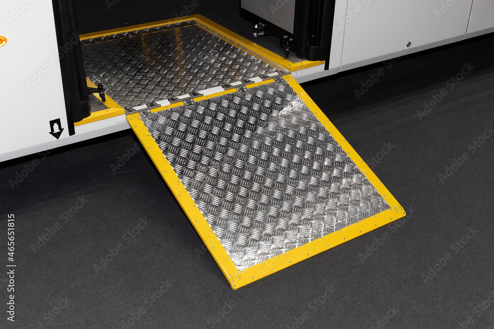 Folding ramp in the bus for the entry of a wheelchair and a baby ...