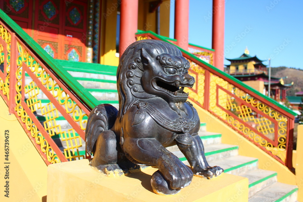 Buddhist Snow Lion bronze sculpture protecting temple entrance Stock ...