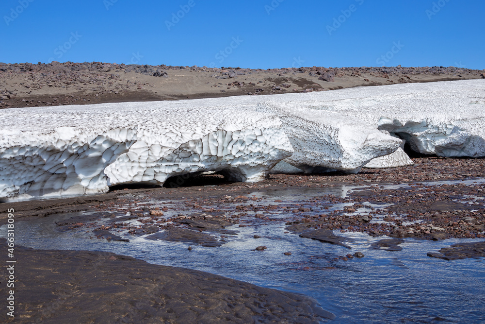 Melting glacier at the feet of Gorely volcano located in the southern ...