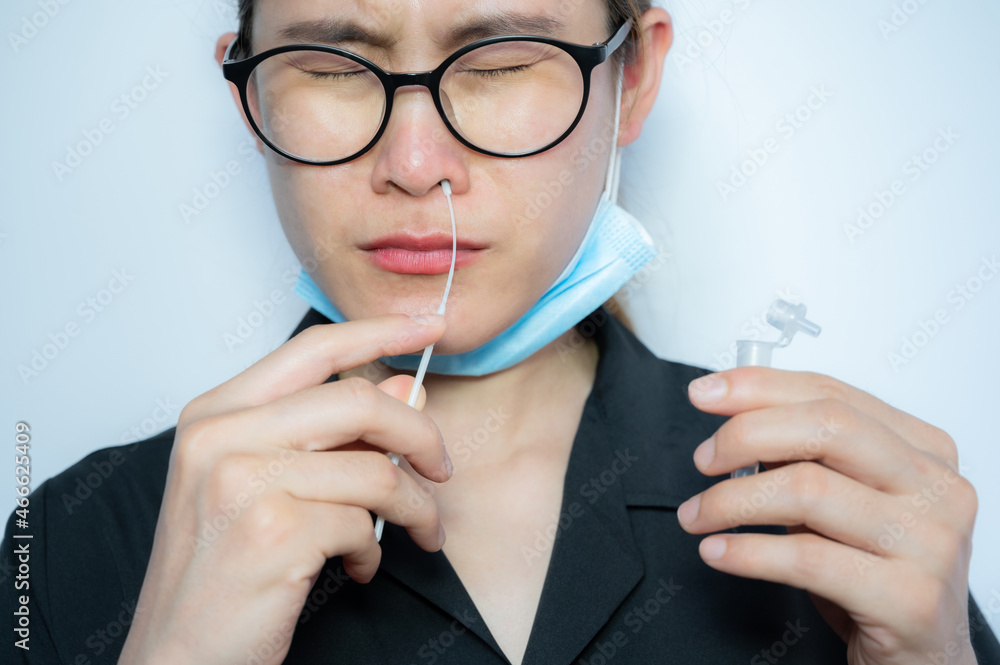 Emotional of Asian woman when using rapid antigen test by nasal swab ...