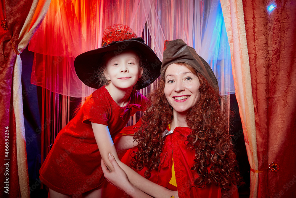 Family during a stylized theatrical circus photo shoot in a beautiful ...
