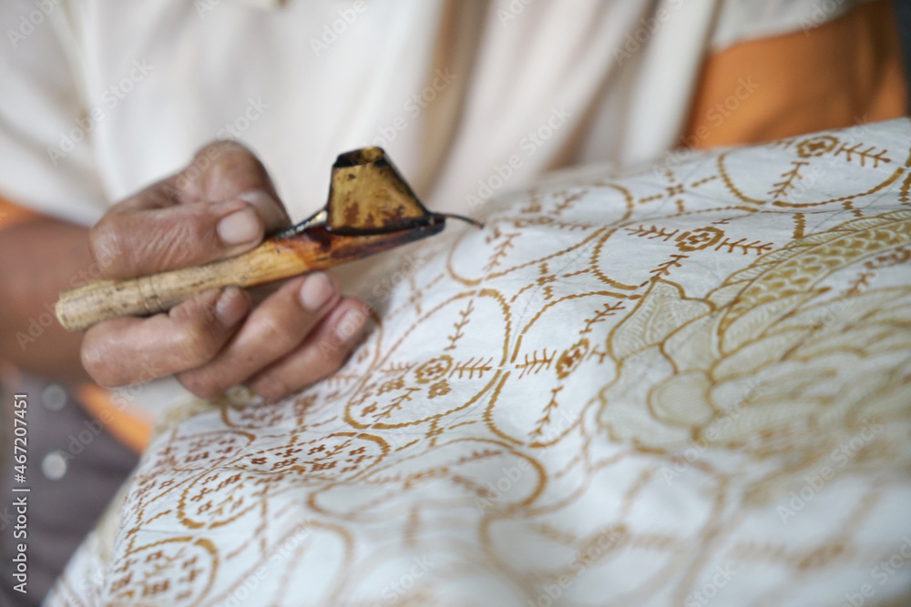 The process of making batik. Batik is a handmade traditional art from ...