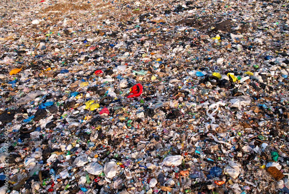 Garbage dump with plastic bags and food waste. Recycling of waste on ...