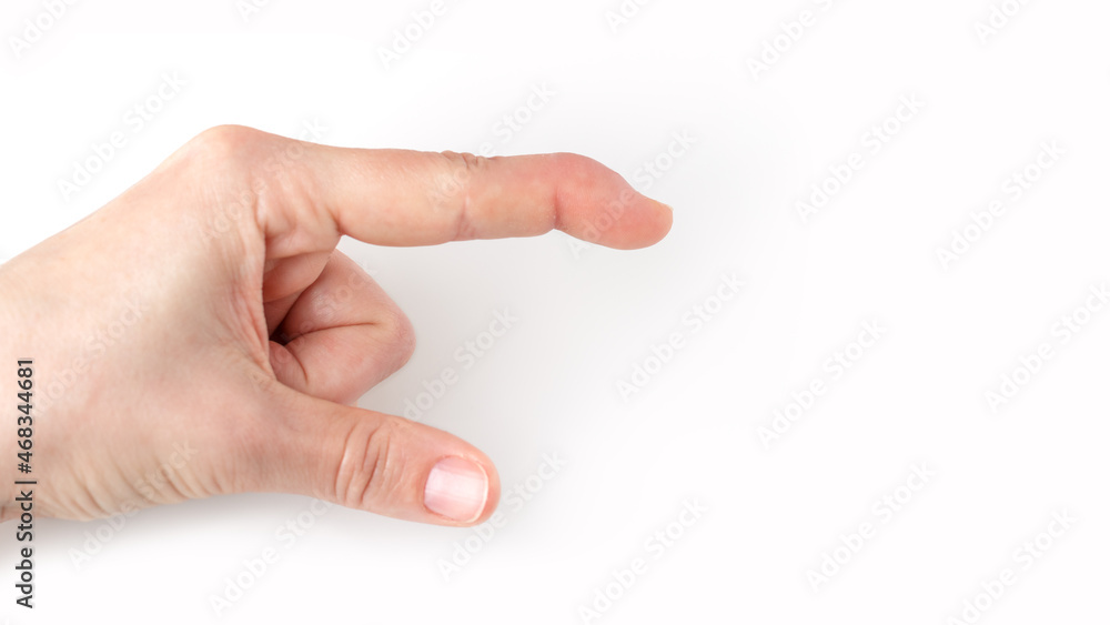 part of left hand showing downwards direction, index finger with a ...
