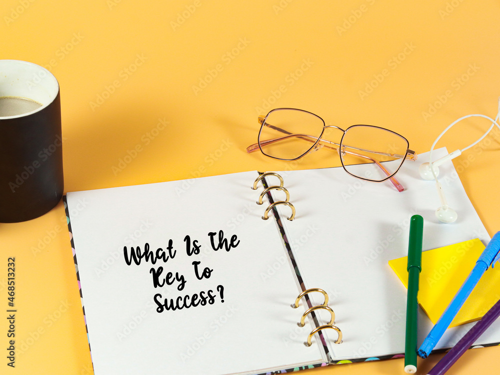 images of note book with what is the key to success? wording on a nude ...