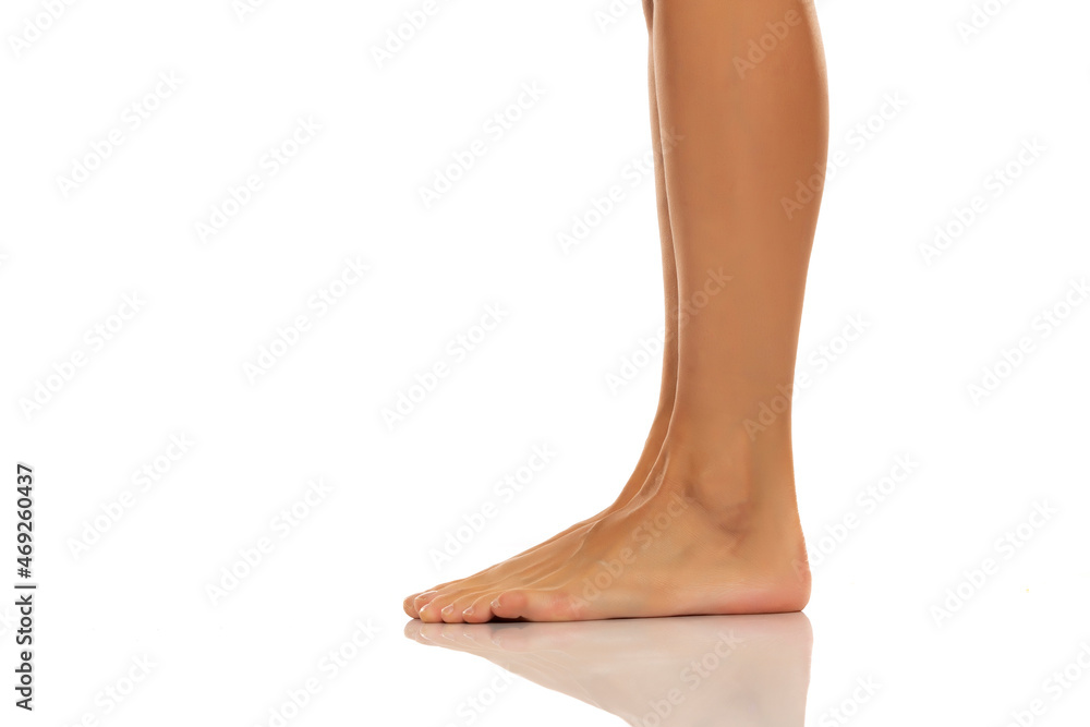 Side view of a beautiful female barefoot legs Stock Photo | Adobe Stock