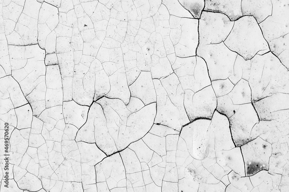 White peeling paint on the wall. Old concrete wall with cracked flaking ...