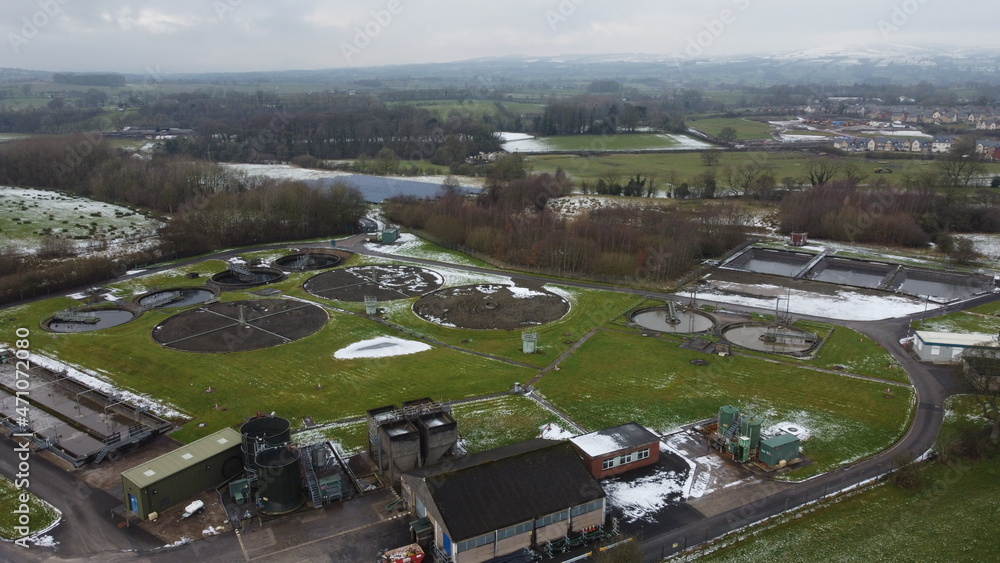 Aerial view of water treatment works creating patterns in the landscape ...
