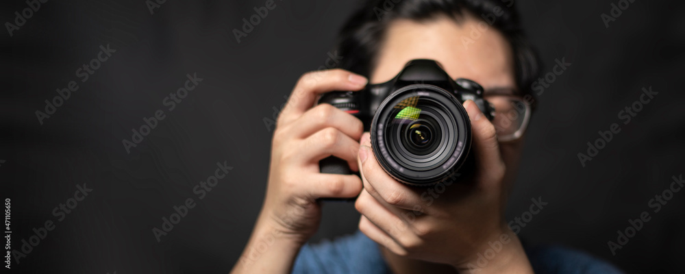 photographer take pictures Snapshot with camera. man hand holding with ...