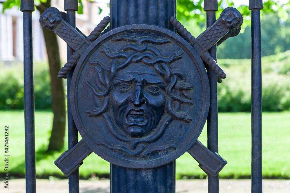Cast-iron fence of the Engineering Bridge at Mikhailovsky Castle with a ...