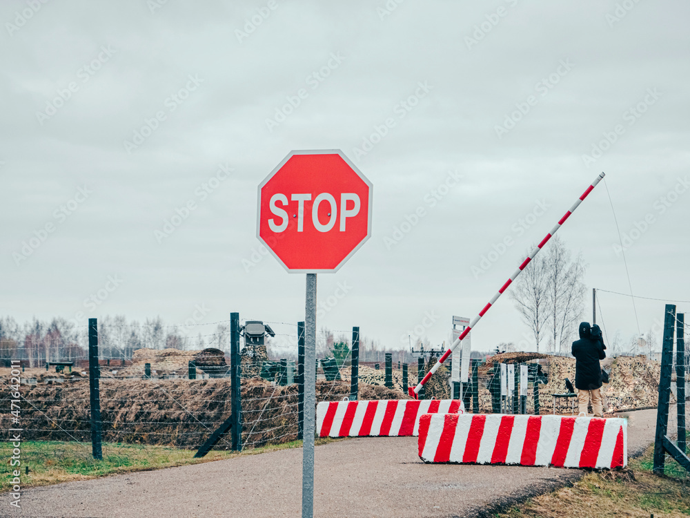 Road checkpoint with STOP sign. Peacekeeping Force Post. Blocking the ...