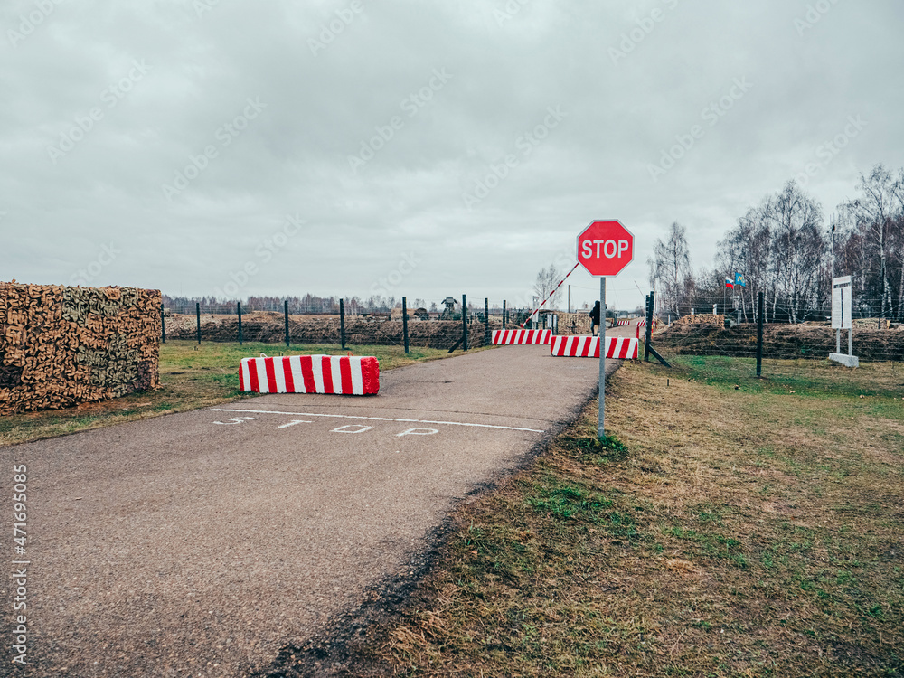 Road checkpoint with STOP sign. Peacekeeping Force Post. Blocking the ...