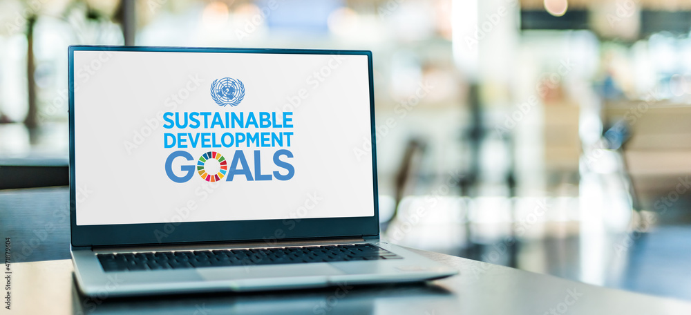 Laptop displaying logo of The Sustainable Development Goals Stock Photo ...