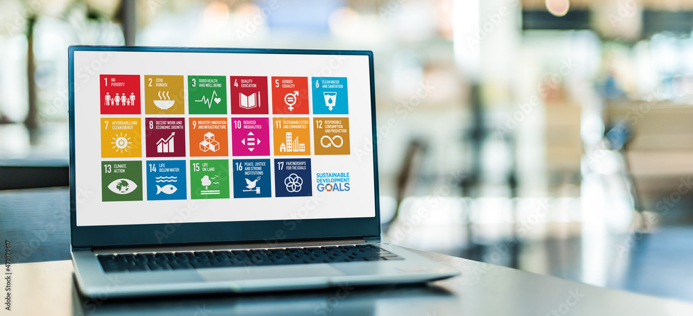 Laptop displaying logo of The Sustainable Development Goals Stock Photo ...
