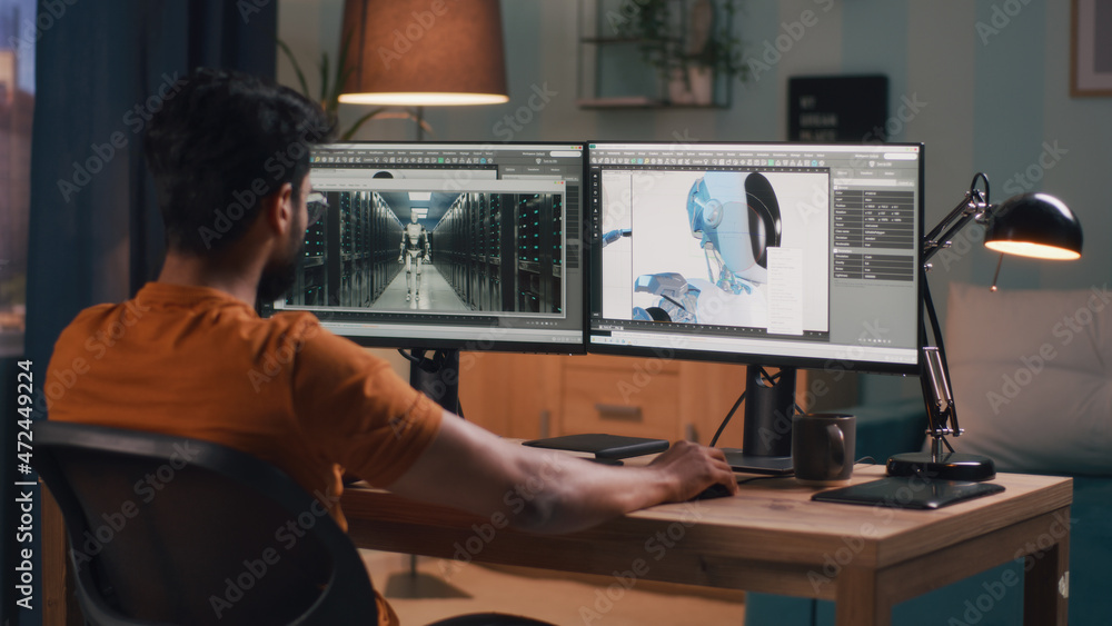 Indian male developer using computer to create and render 3D model of ...