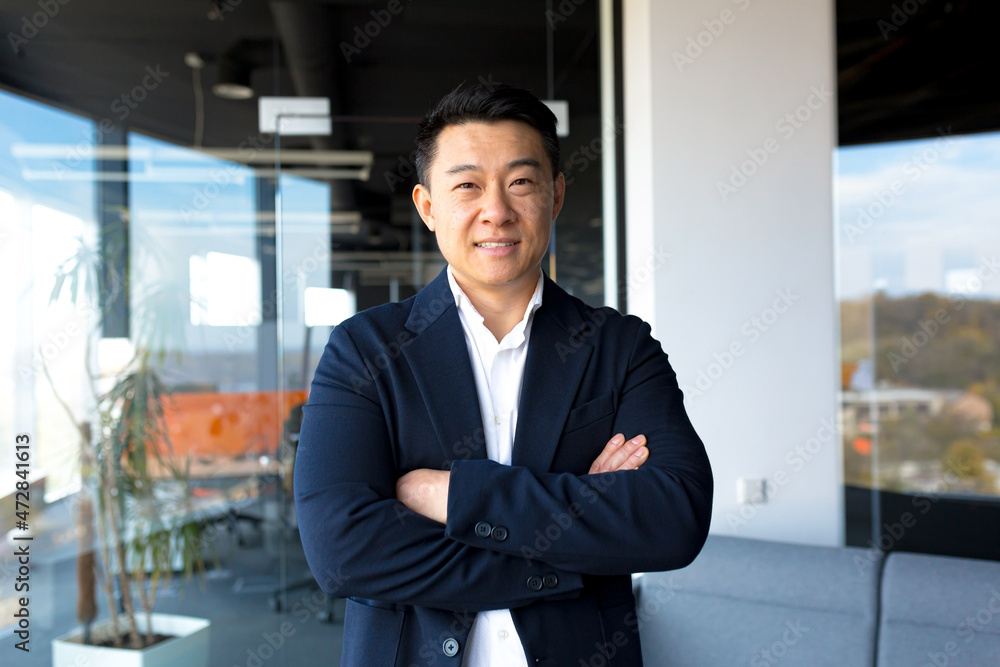 Portrait of successful business owner male boss asian cheerful happy ...