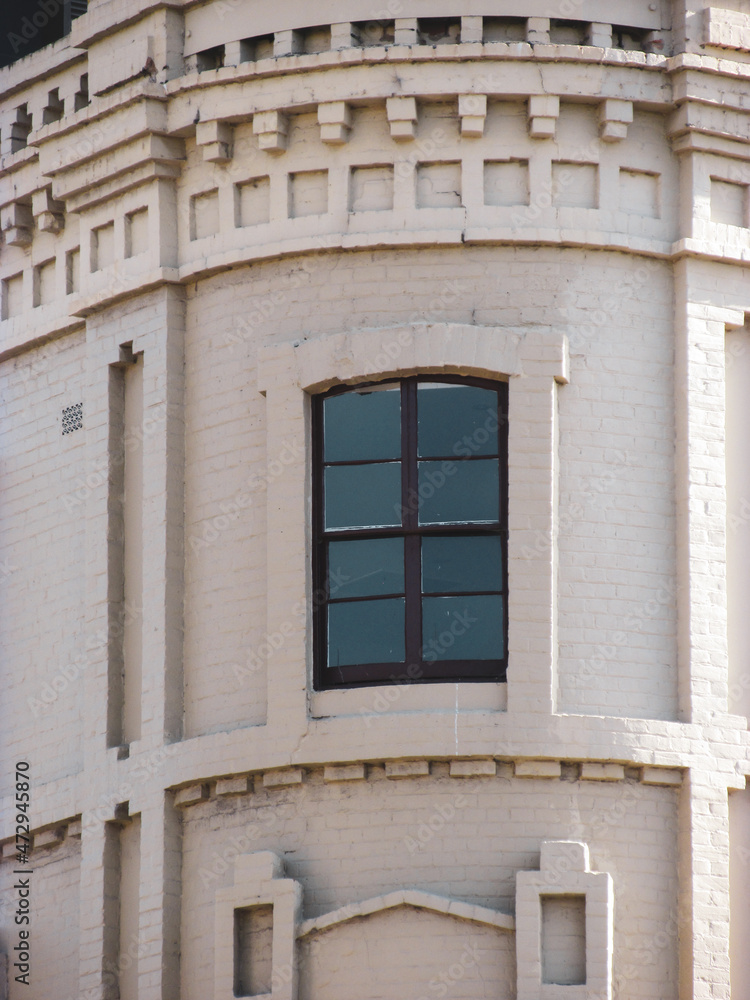 Vertical windows on 19th century building. During this period ...